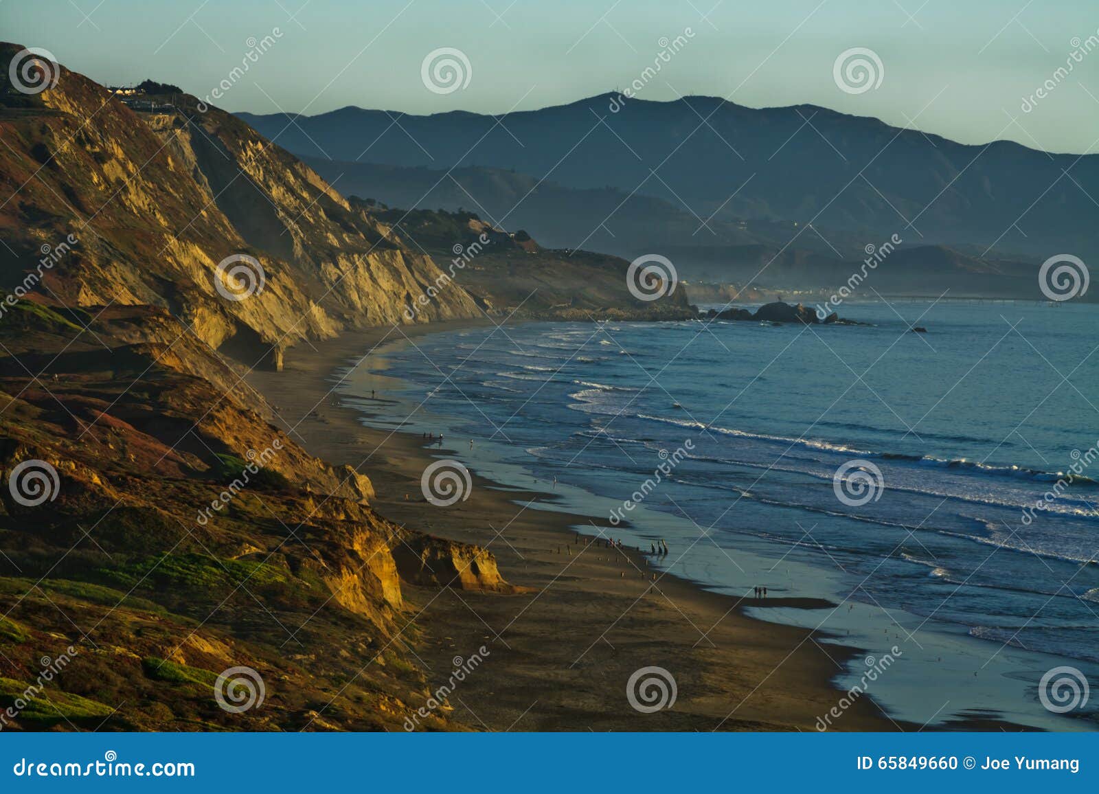 Sunset Setting on the Ocean Beach Cliff Stock Photo - Image of yellow ...