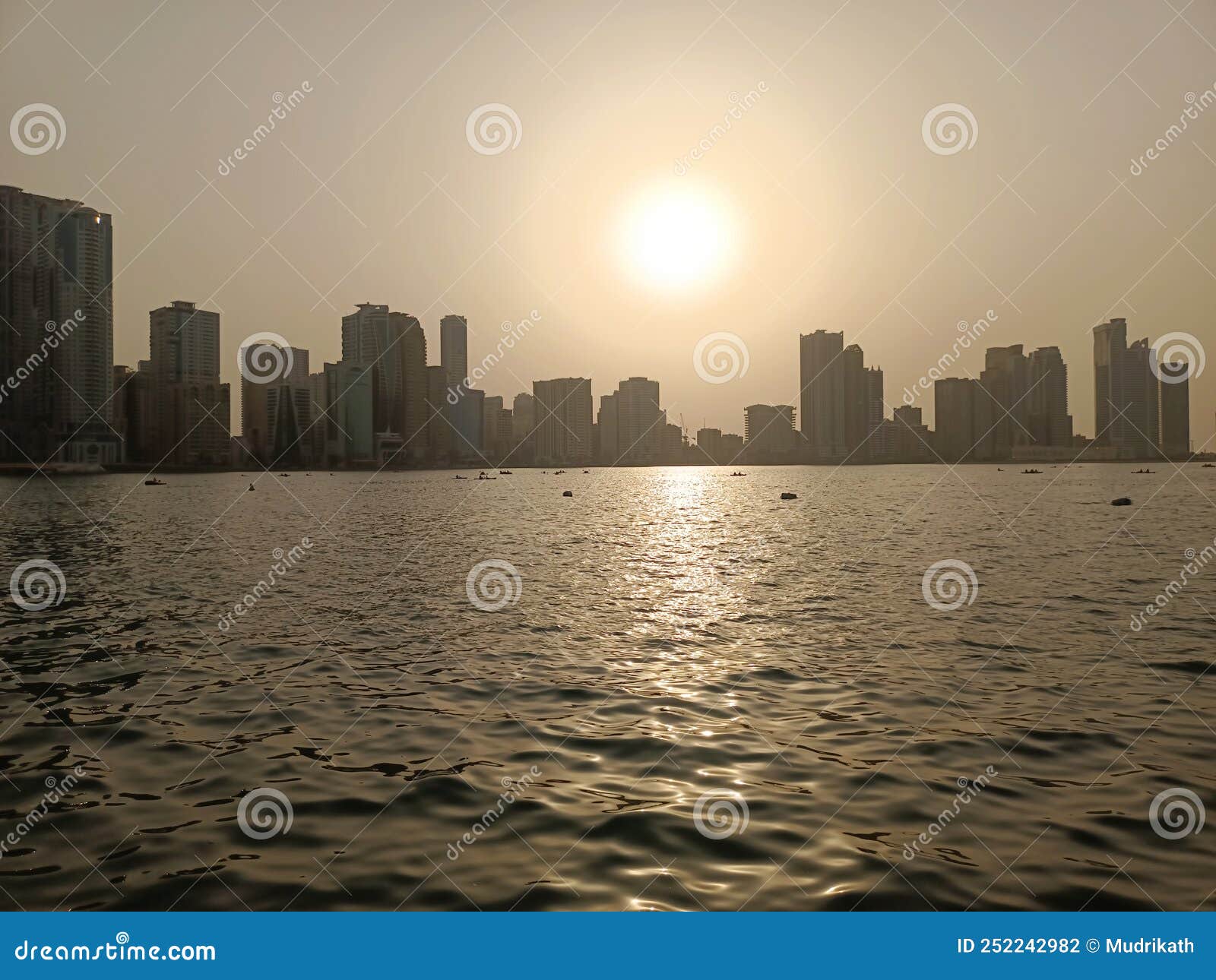 Sunset in Sharjah Beach with Sun Stock Photo - Image of reflection ...