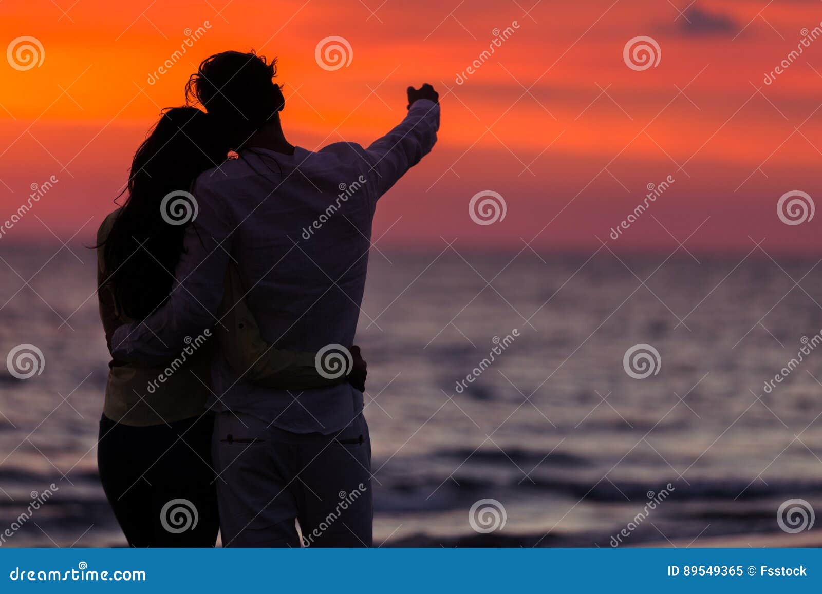 Sunset Silhouette of Young Couple in Love Hugging at Beach Stock Image ...