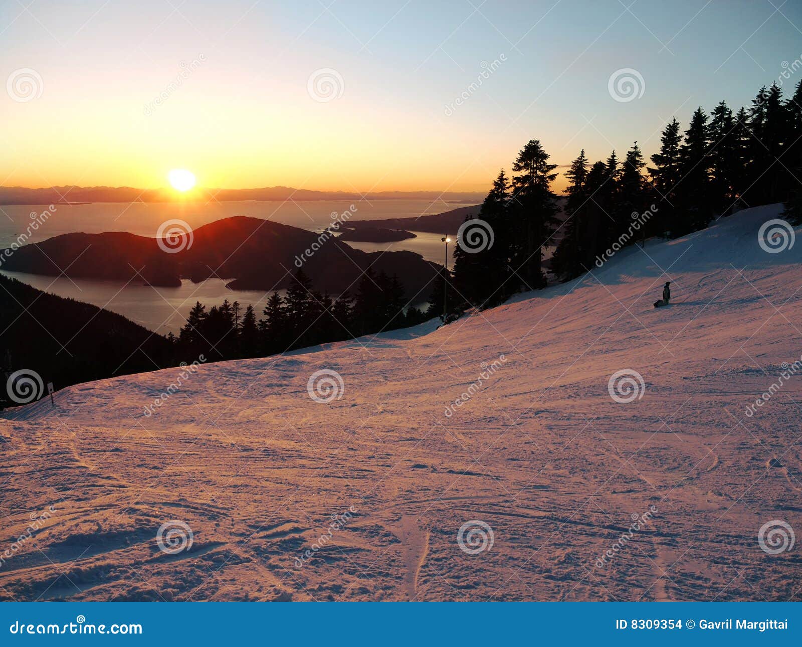 Sunset on the ski slope stock photo. Image of british - 8309354