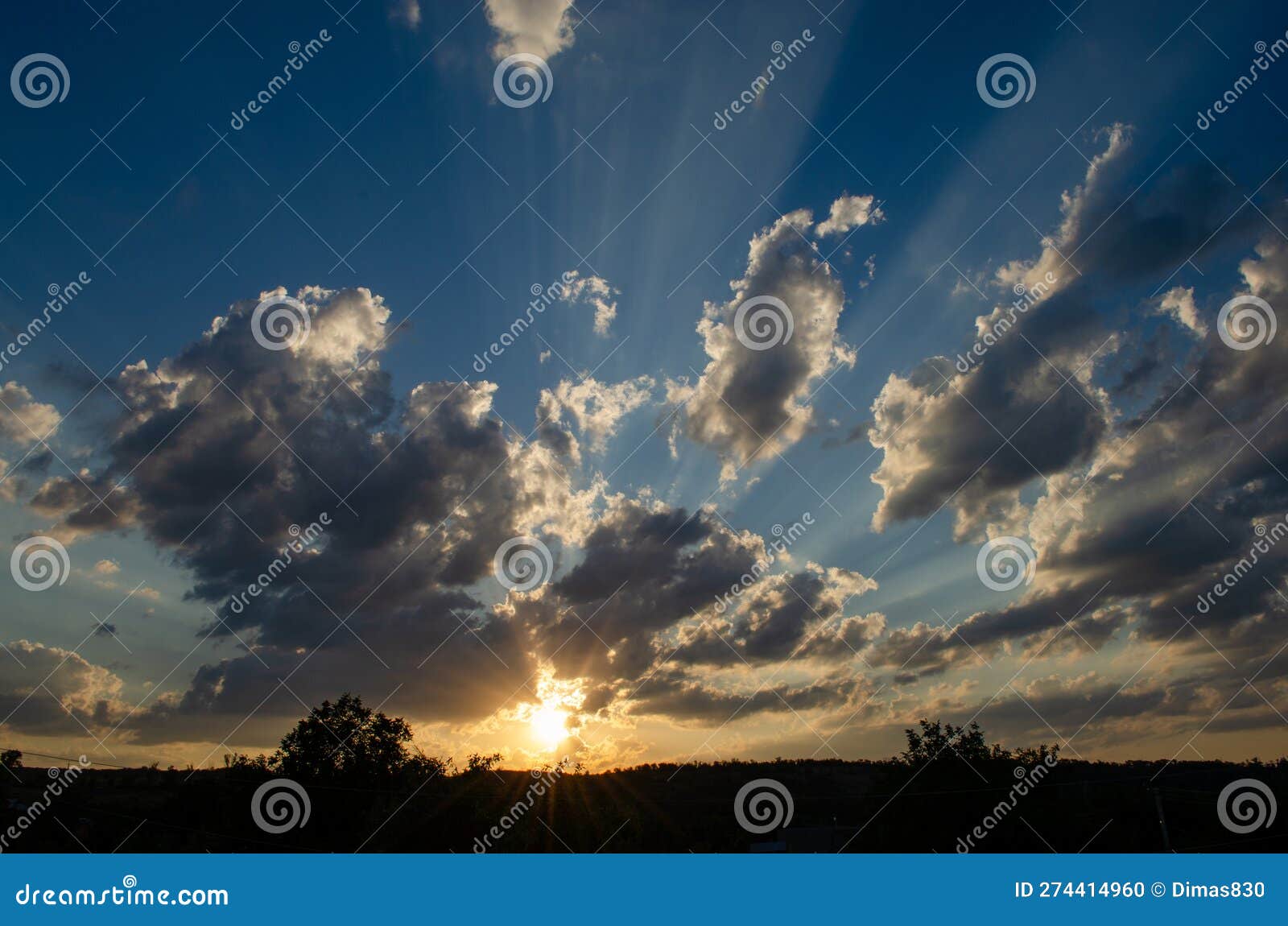 Sunset in the Sky with Rain Clouds Stock Photo - Image of clouds ...