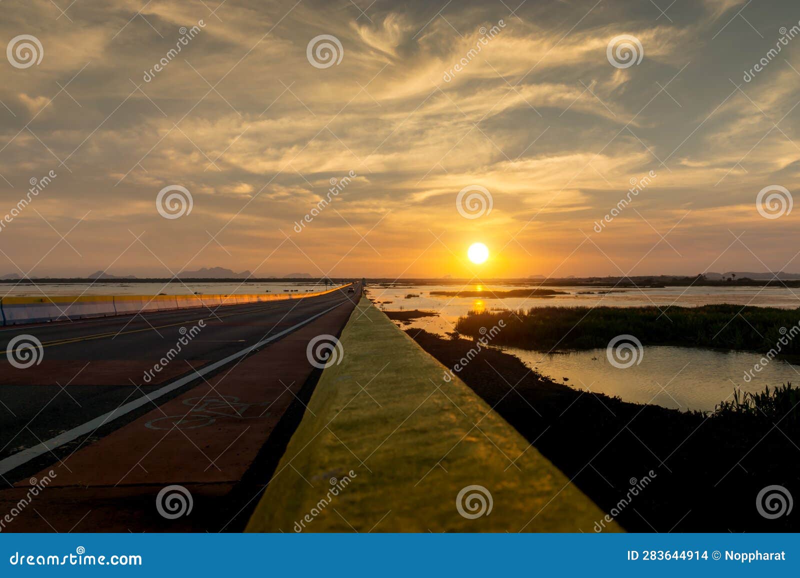 Sunset sky with road stock photo. Image of reflection - 283644914