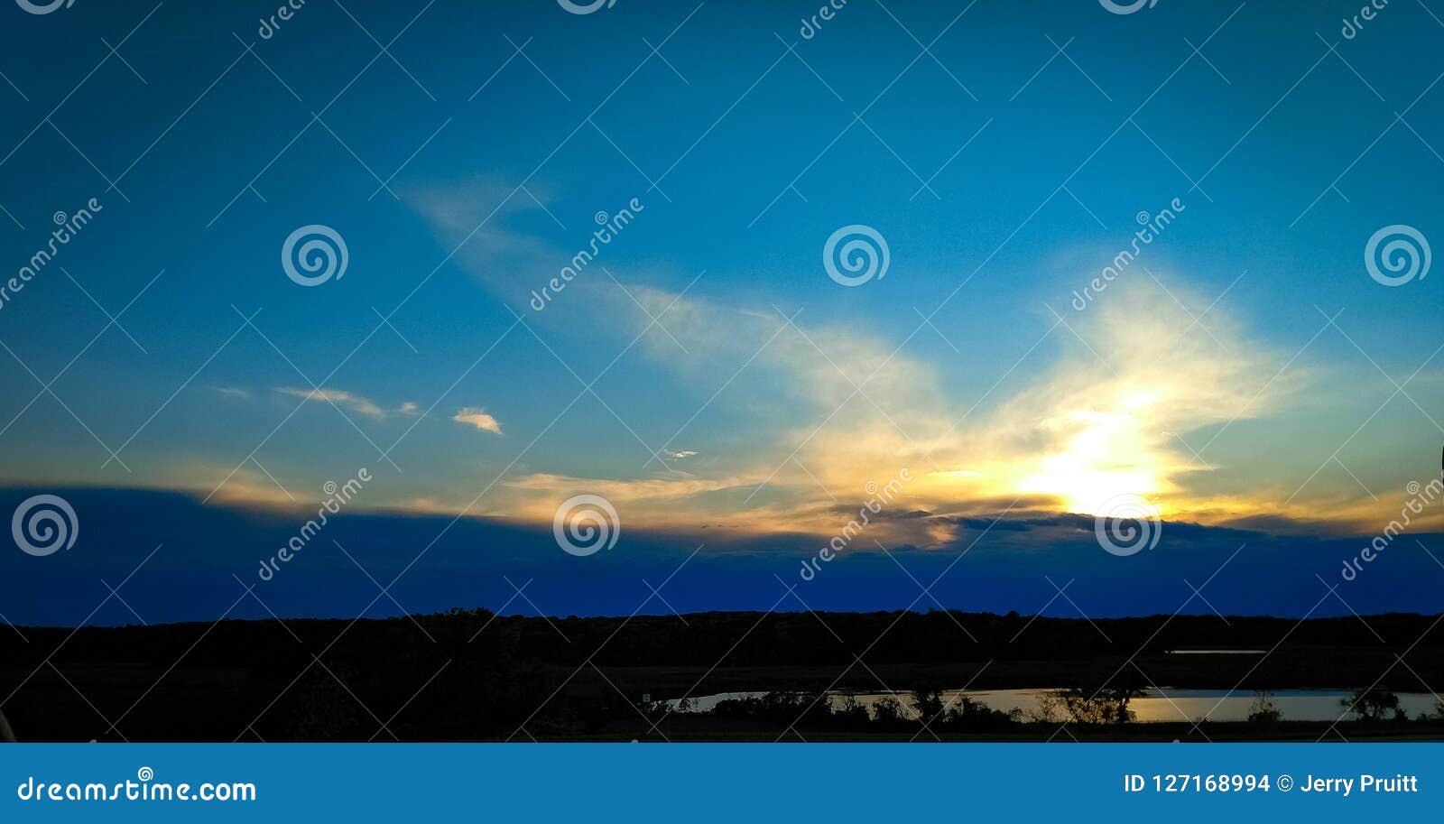 Sunset Sky with Treeline Silhouette Stock Photo - Image of treeline ...