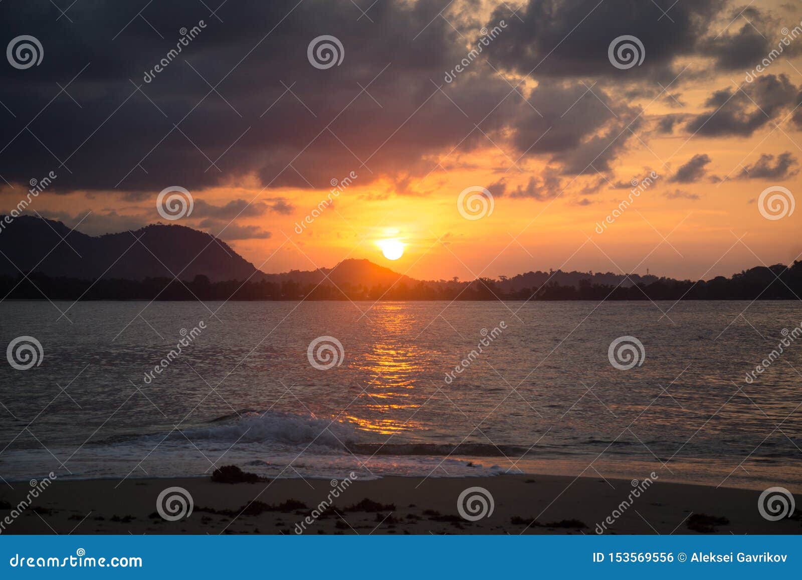 The Sunset on Small Island in Papua Stock Photo - Image of reflection ...