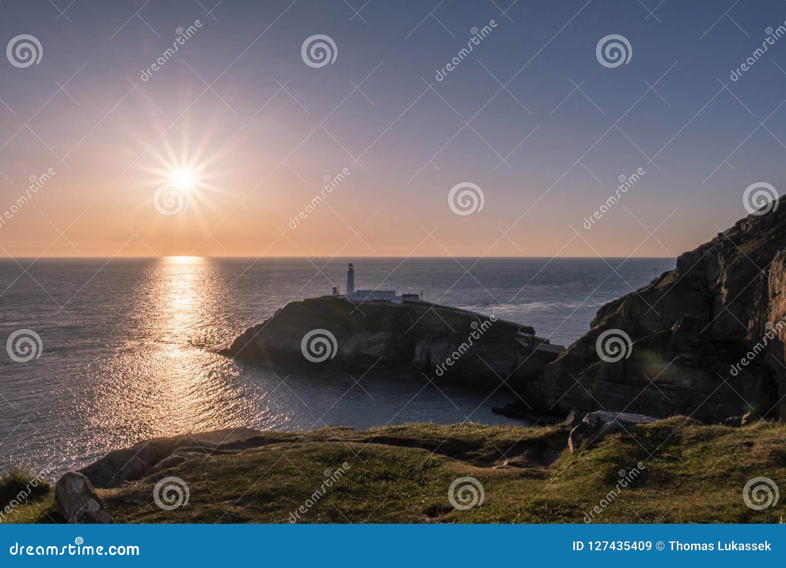 Sunset at South Stack Lighthouse on Anglesey in Wales Stock Image ...