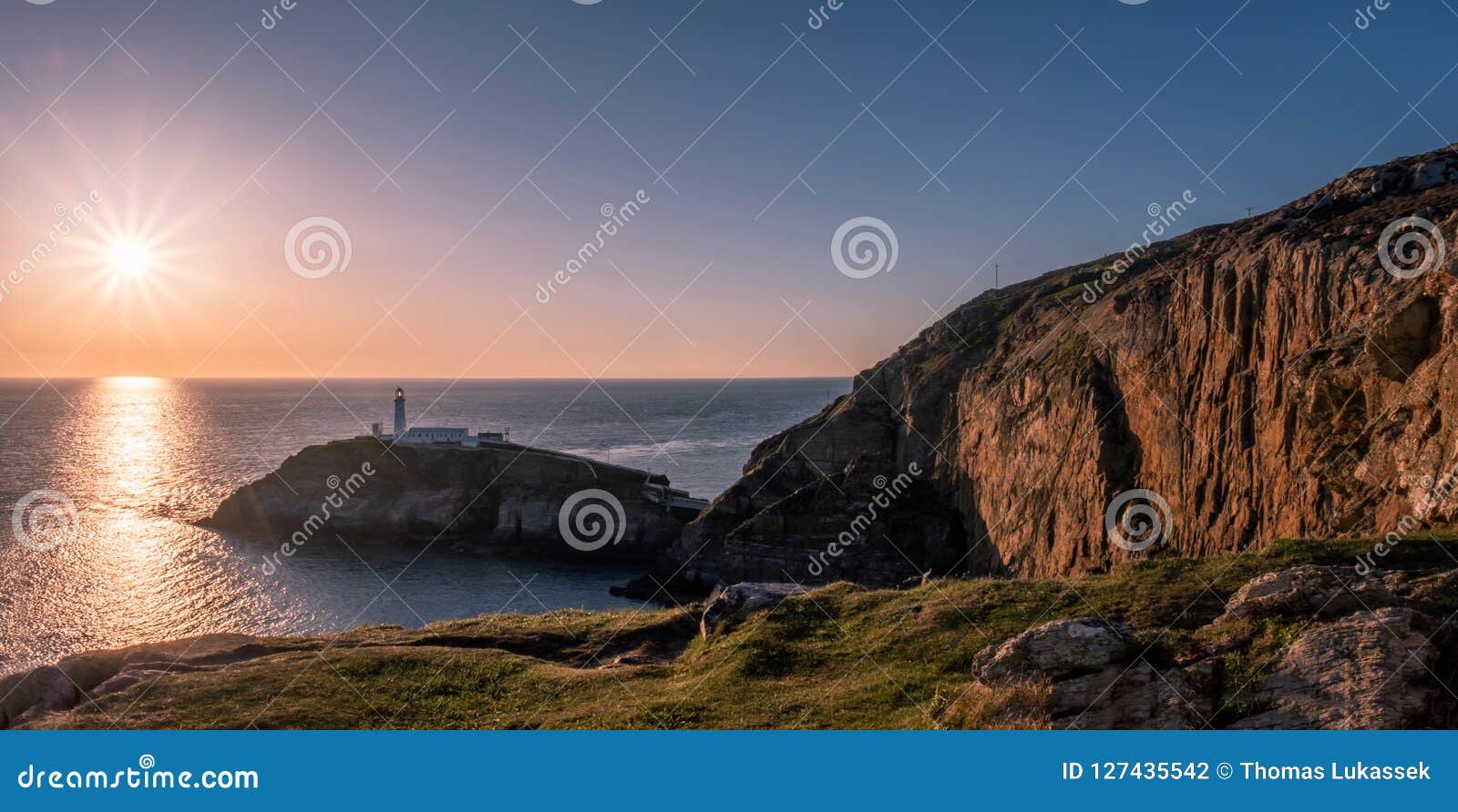 Sunset at South Stack Lighthouse on Anglesey in Wales Stock Photo ...