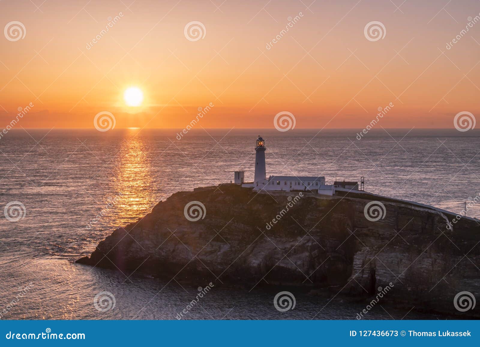 Sunset at South Stack Lighthouse on Anglesey in Wales Stock Image ...