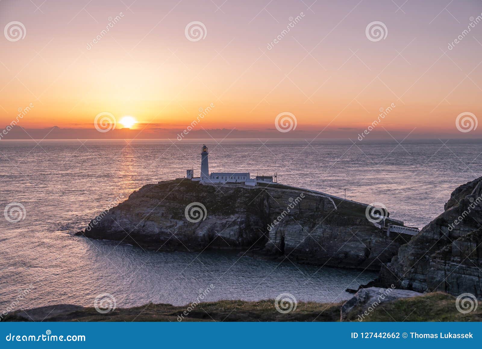 Sunset at South Stack Lighthouse on Anglesey in Wales Stock Photo ...