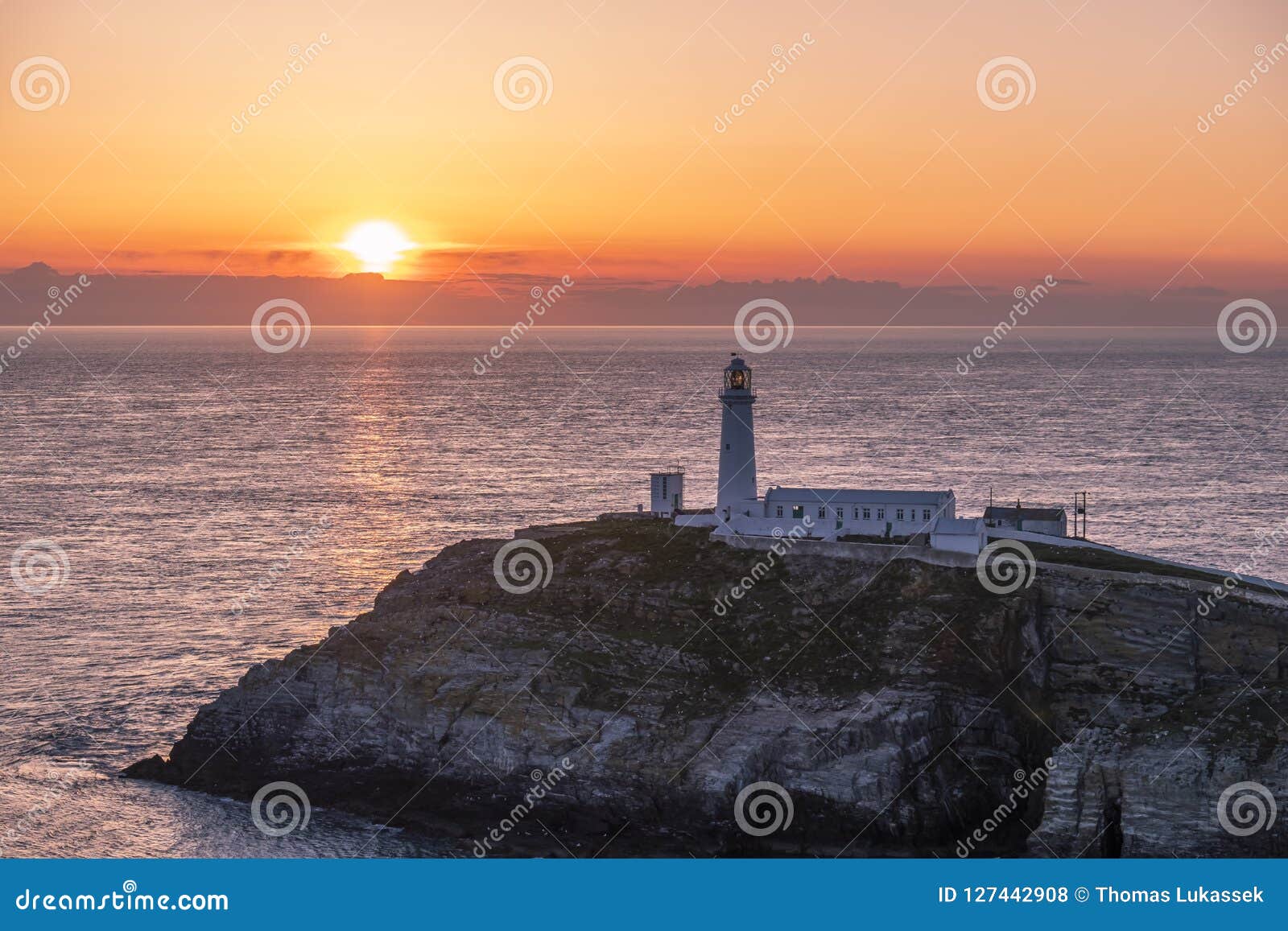 Sunset at South Stack Lighthouse on Anglesey in Wales Stock Photo ...
