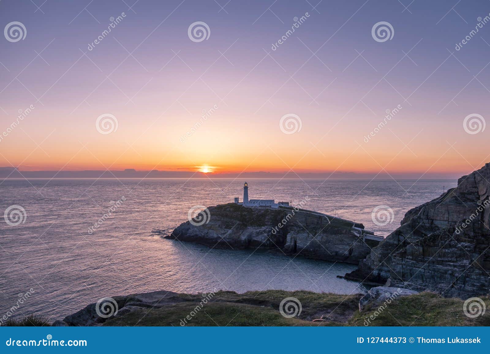 Sunset at South Stack Lighthouse on Anglesey in Wales Stock Image ...