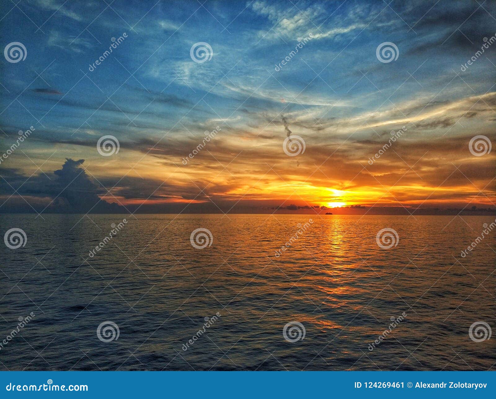 Sunset, still water stock image. Image of still, ocean - 124269461
