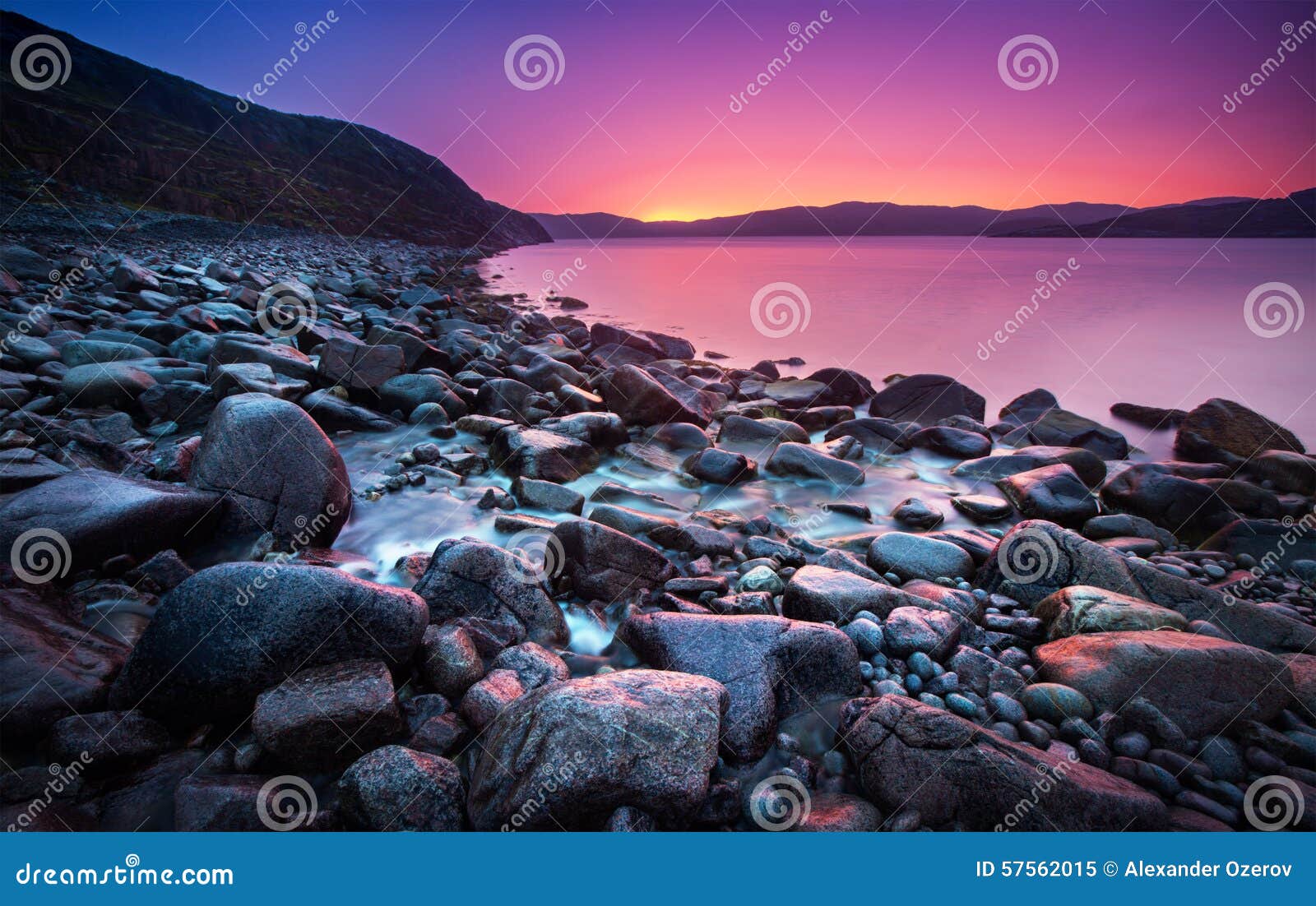 Sunset on the stone coast stock image. Image of beach - 57562015