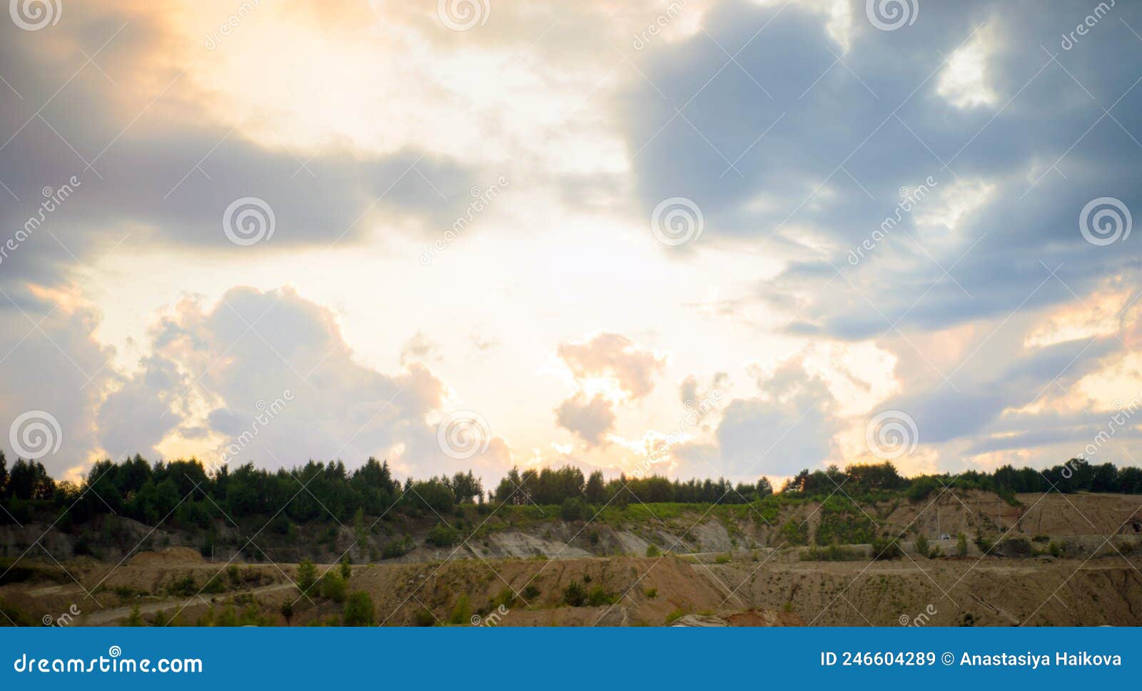 Sunset with Storm Clouds Over a Quarry and Forest in Summer Stock Image ...