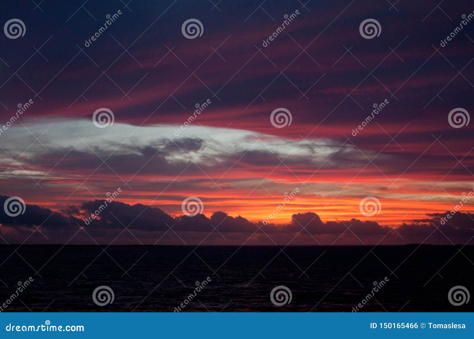 Sunset after a Storm in Tonga Stock Photo - Image of water, sunshine ...