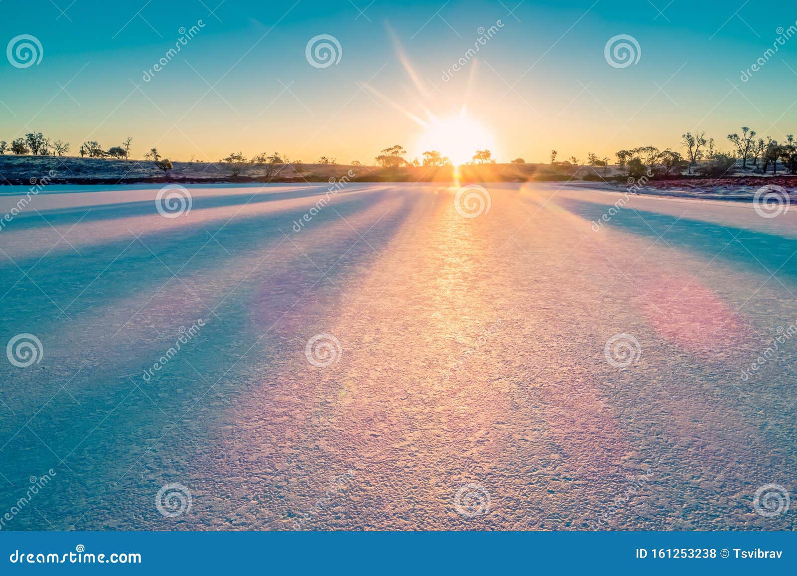 Sunset with Sun Flare Over Salt Lake in the Desert. Stock Photo - Image ...