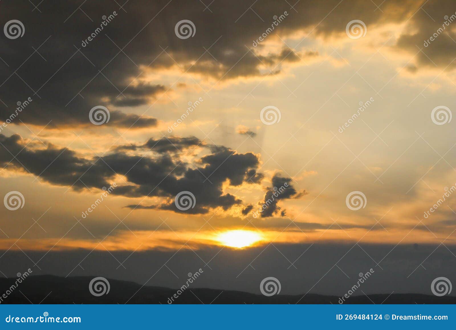 A Sunset with the Sun Rays Shining Stock Photo - Image of shining, rays ...