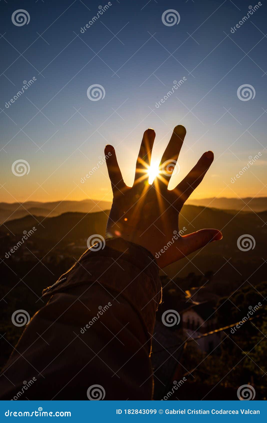 Sunset Sun Rays View Through The Fingers Of A Feminine Open Hand ...