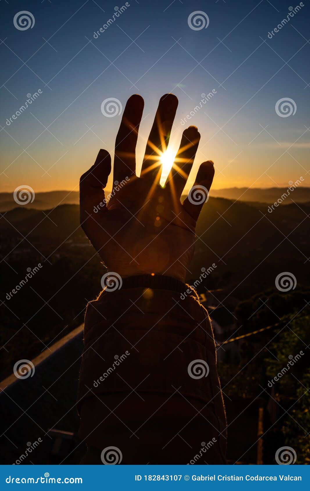 Sunset Sun Rays View through the Fingers of a Feminine Open Hand Stock ...