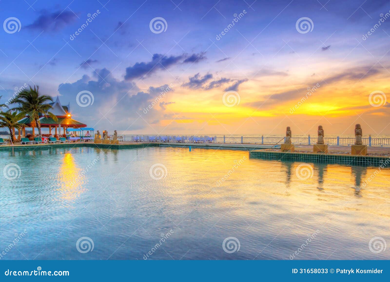 Sunset at swimming pool stock image. Image of rebuld - 31658033