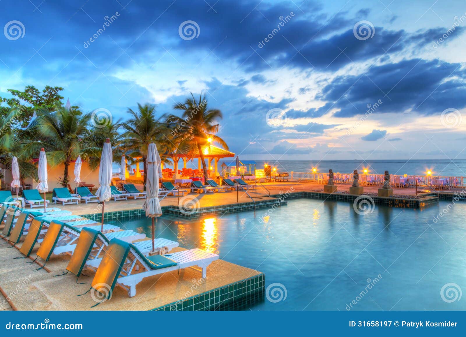 Sunset at swimming pool stock image. Image of leisure - 31658197