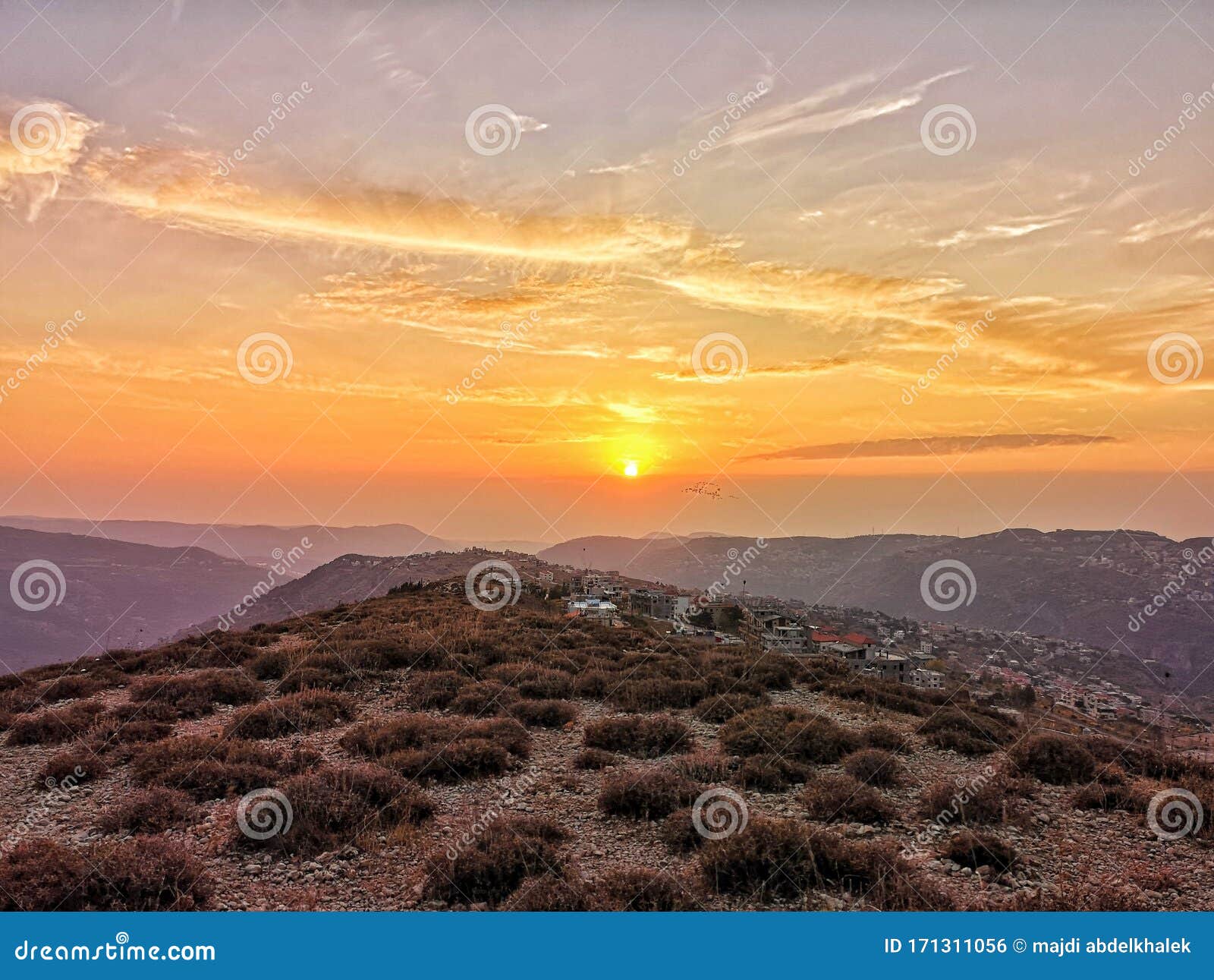 Sunset on Top of the Mountain Stock Photo - Image of sunset, clouds ...