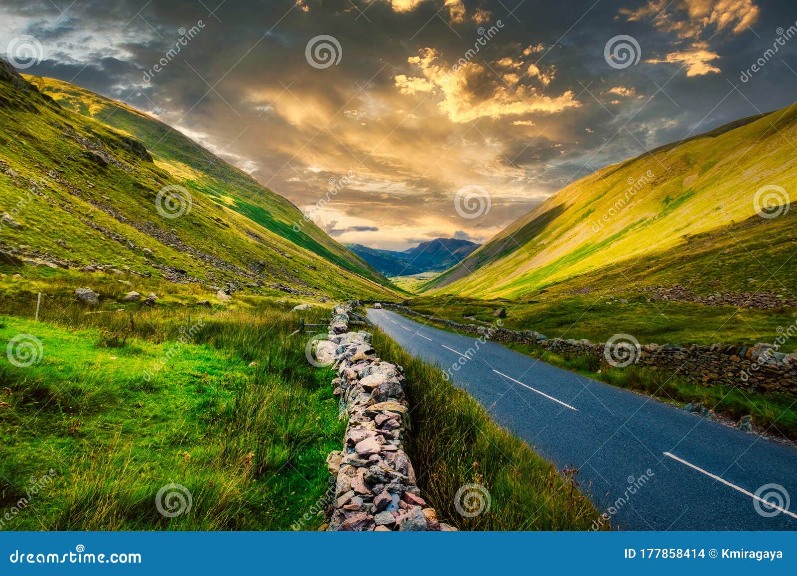 Sunset on a Valley among the Mountains at the Lake District in England ...