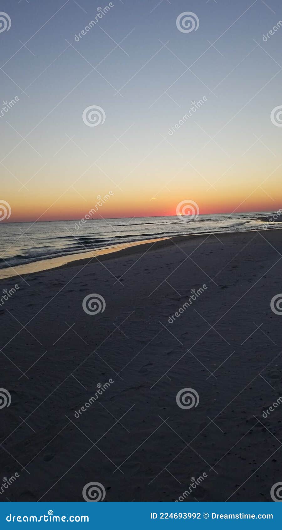 Sunset view at the beach stock photo. Image of sunset - 224693992