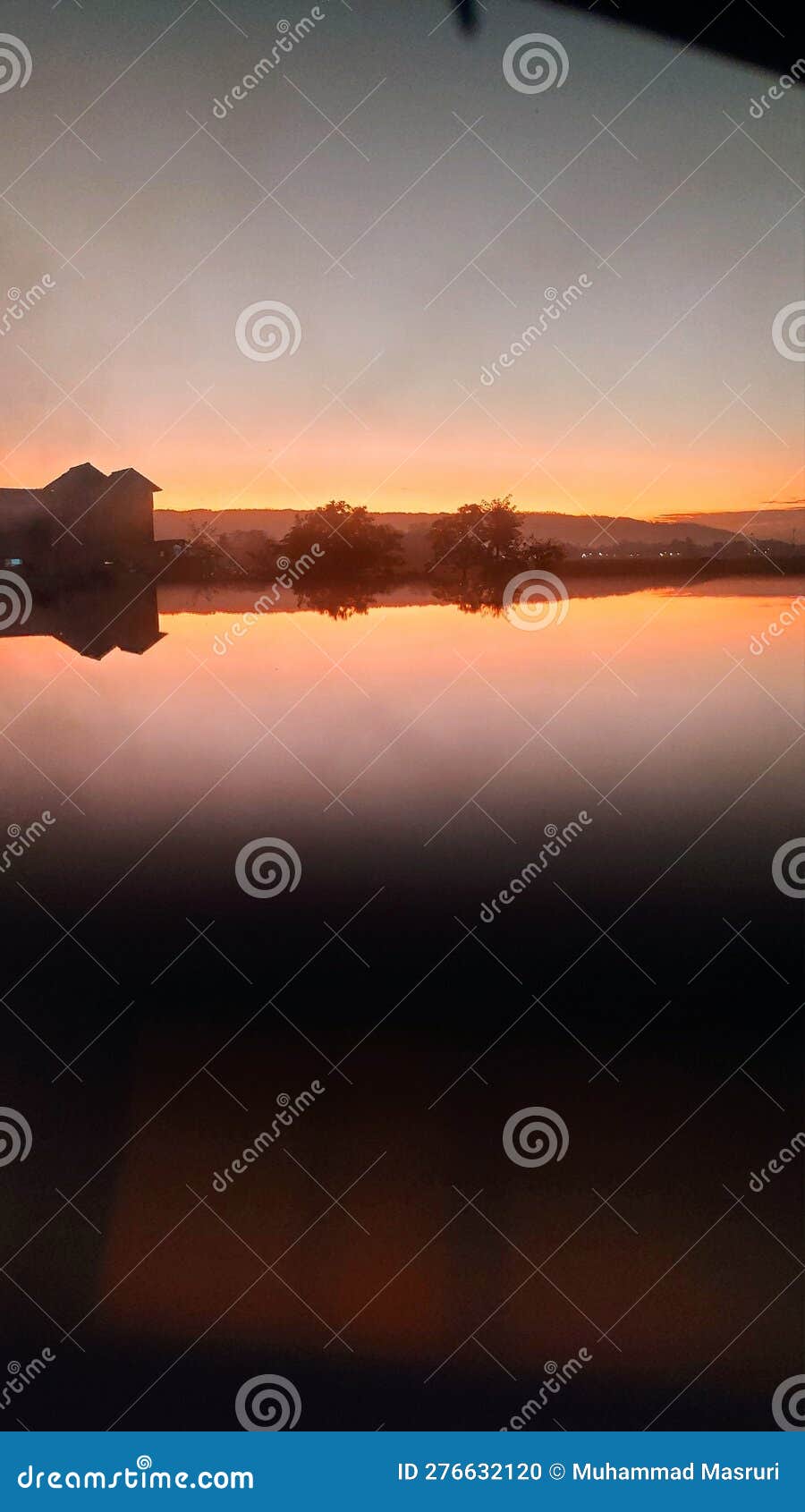 Sunset View in the Evening with the Reflection of the Shadow in the ...