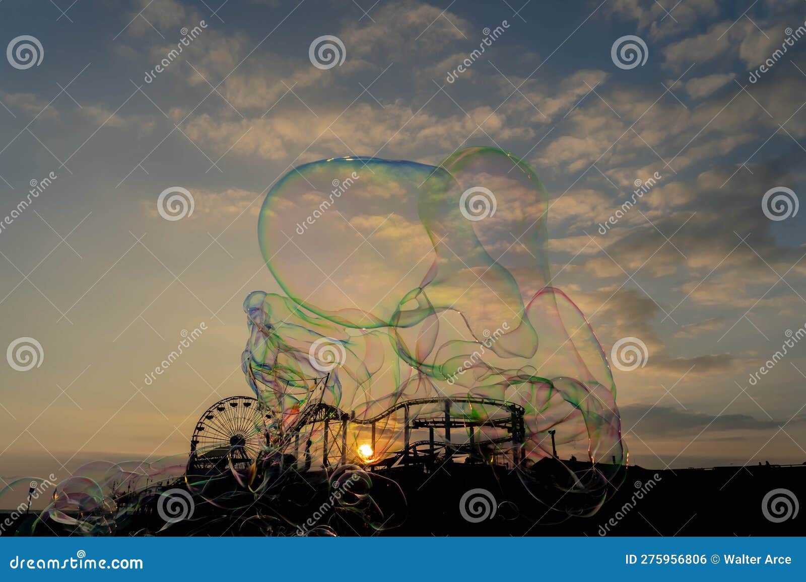 Sunset View of a Pier on the California Coast with Liquid Bubbles in ...