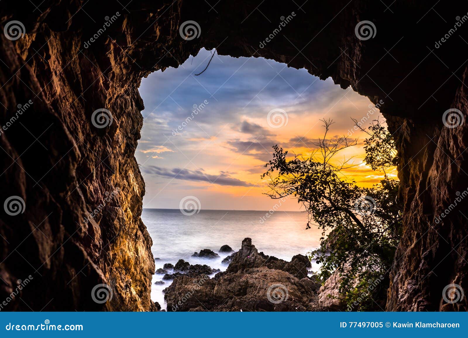 Sunset Viewed through a Cave by the Sea Stock Image - Image of superior ...