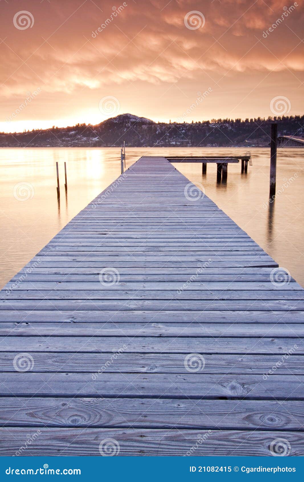 Sunset Viewed from a Dock on a Mountain Lake Stock Image - Image of ...