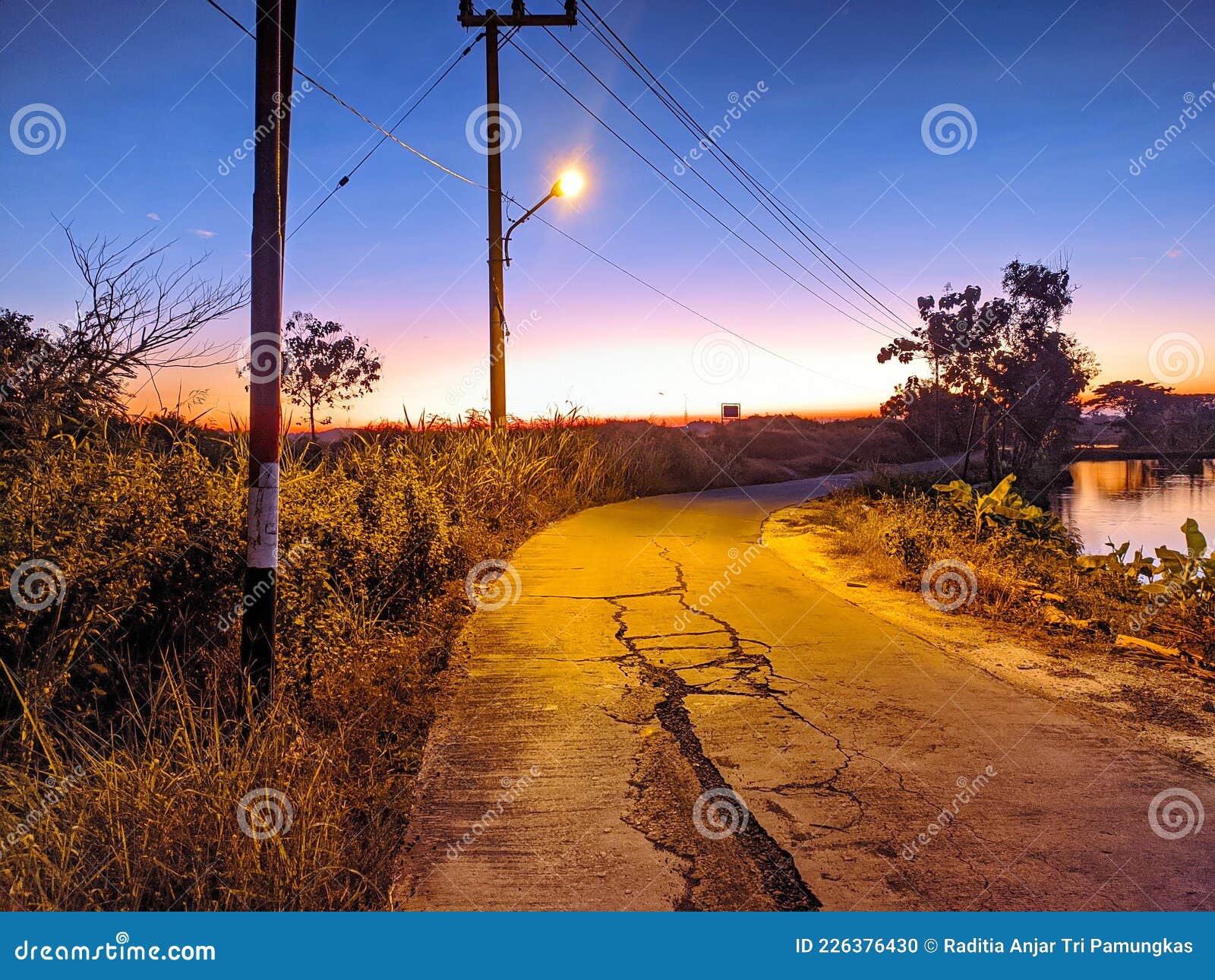 Sunset on village stock photo. Image of dusk, field - 226376430
