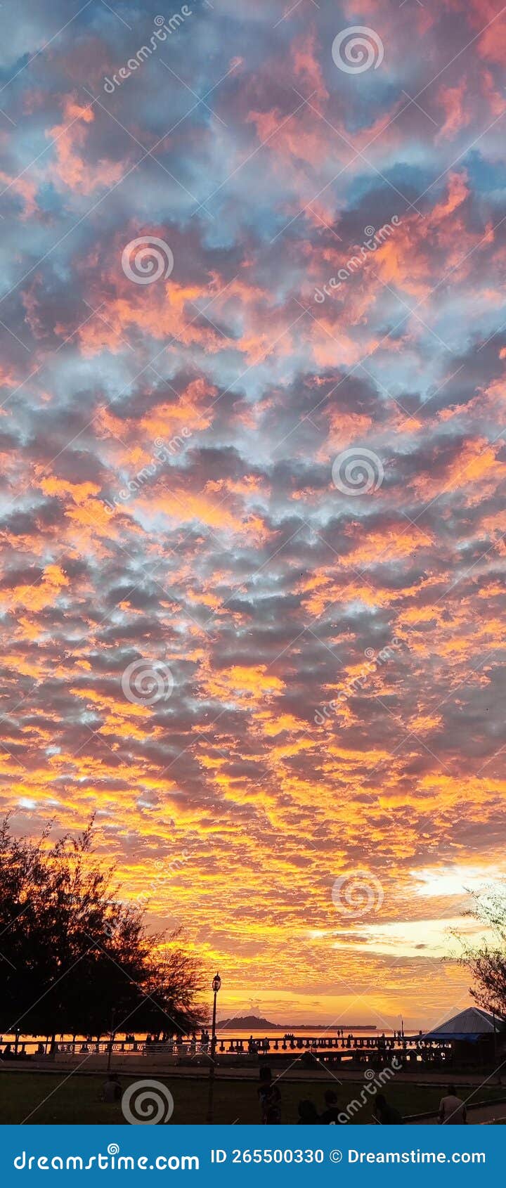 Sunset in village stock photo. Image of sunset, beach - 265500330