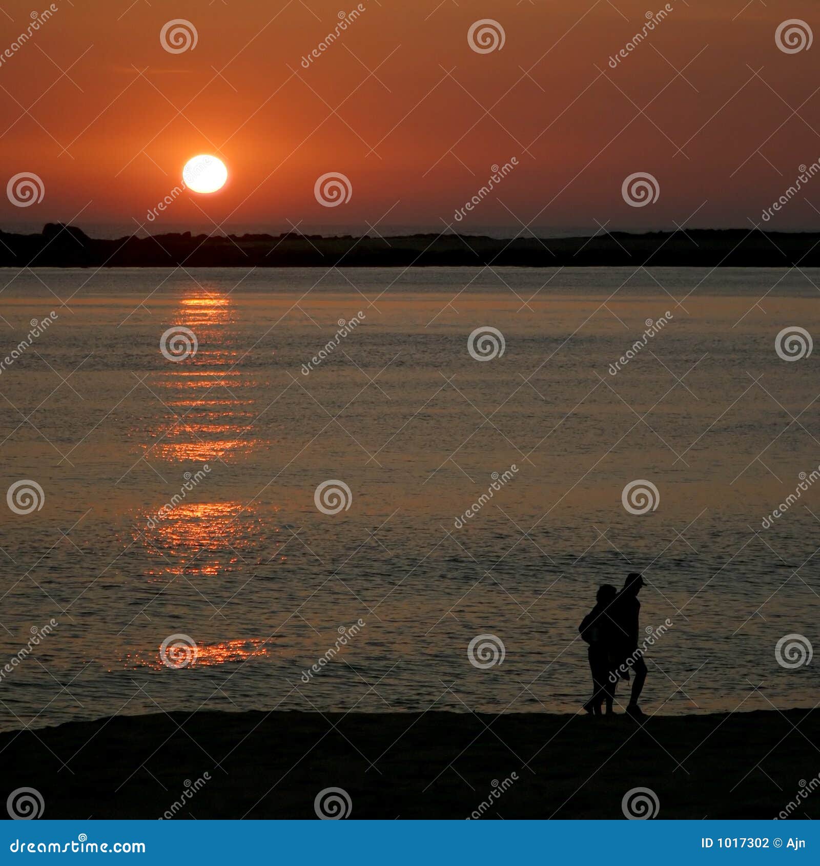 Sunset Walk stock photo. Image of seaside, people, couple - 1017302