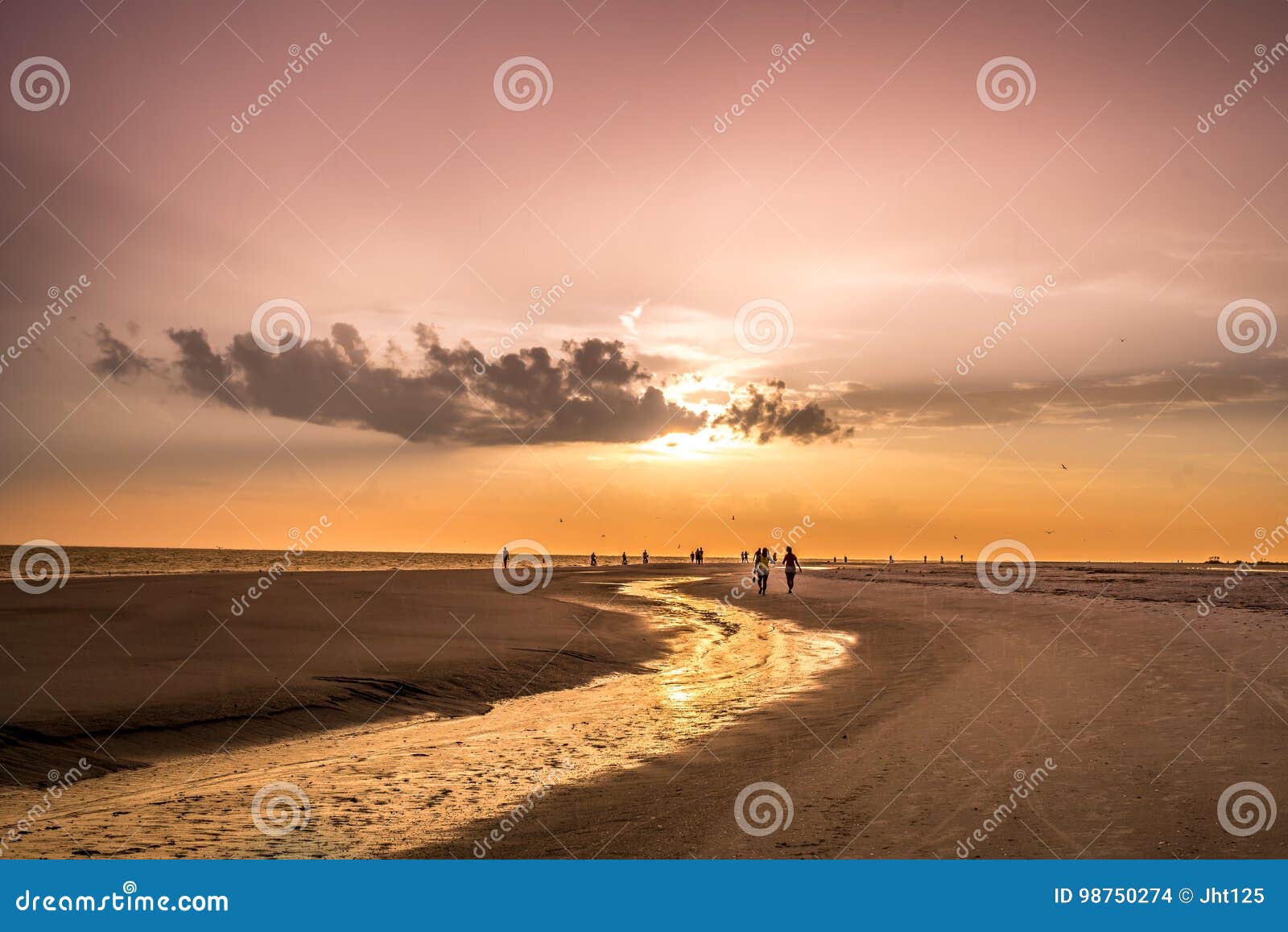 Sunset at the Beach stock photo. Image of clouds, rainyday - 98750274