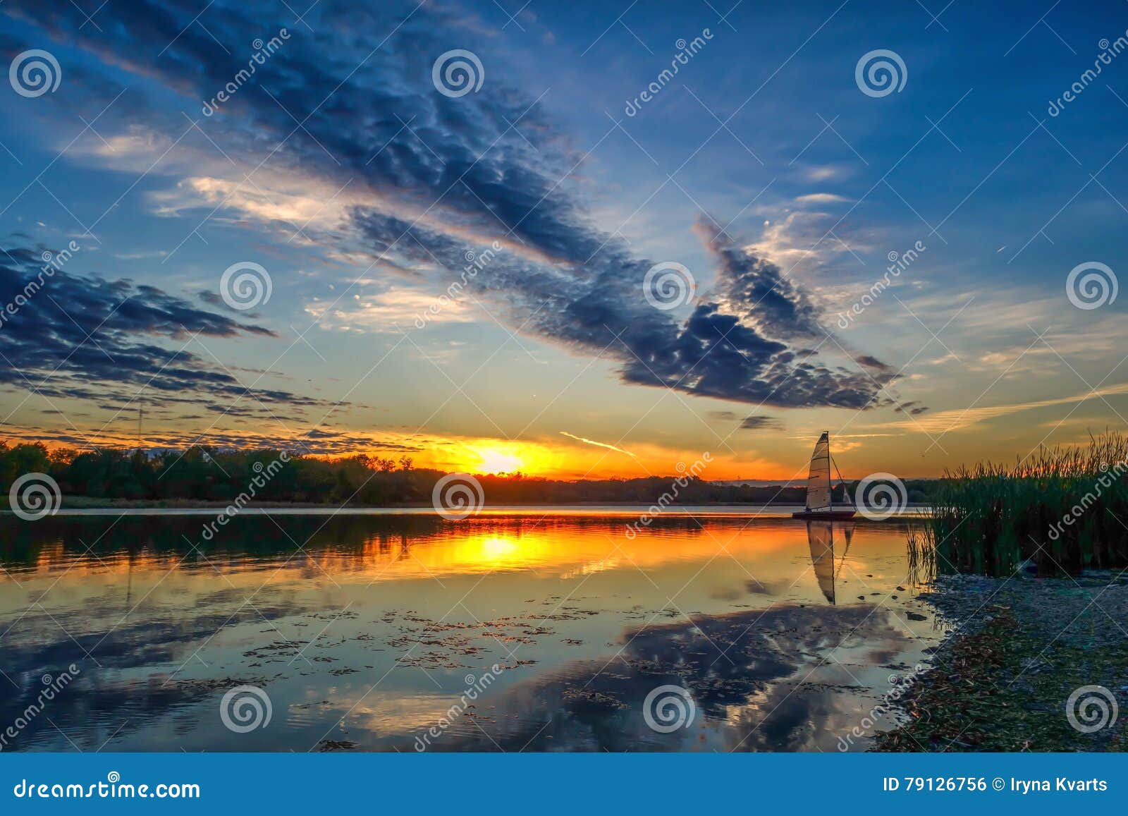 Sunset on the water stock photo. Image of clouds, breathtaking - 79126756