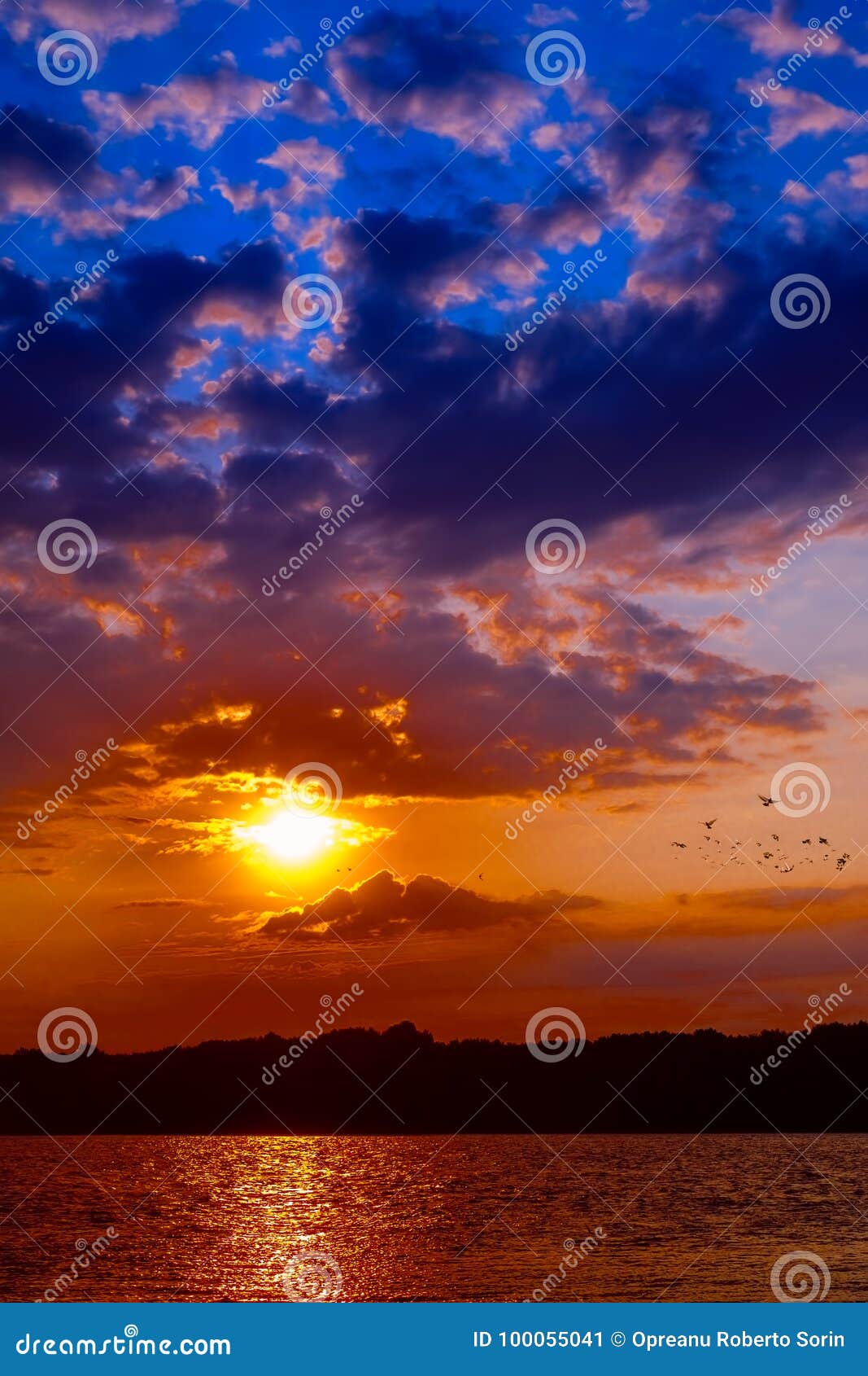 Sunset on water stock image. Image of dramatic, bright - 100055041