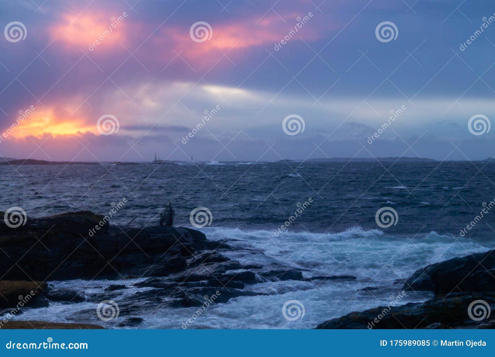 Waves from Ocean Hitting Rocks with Clouds an Sunset Stock Image ...