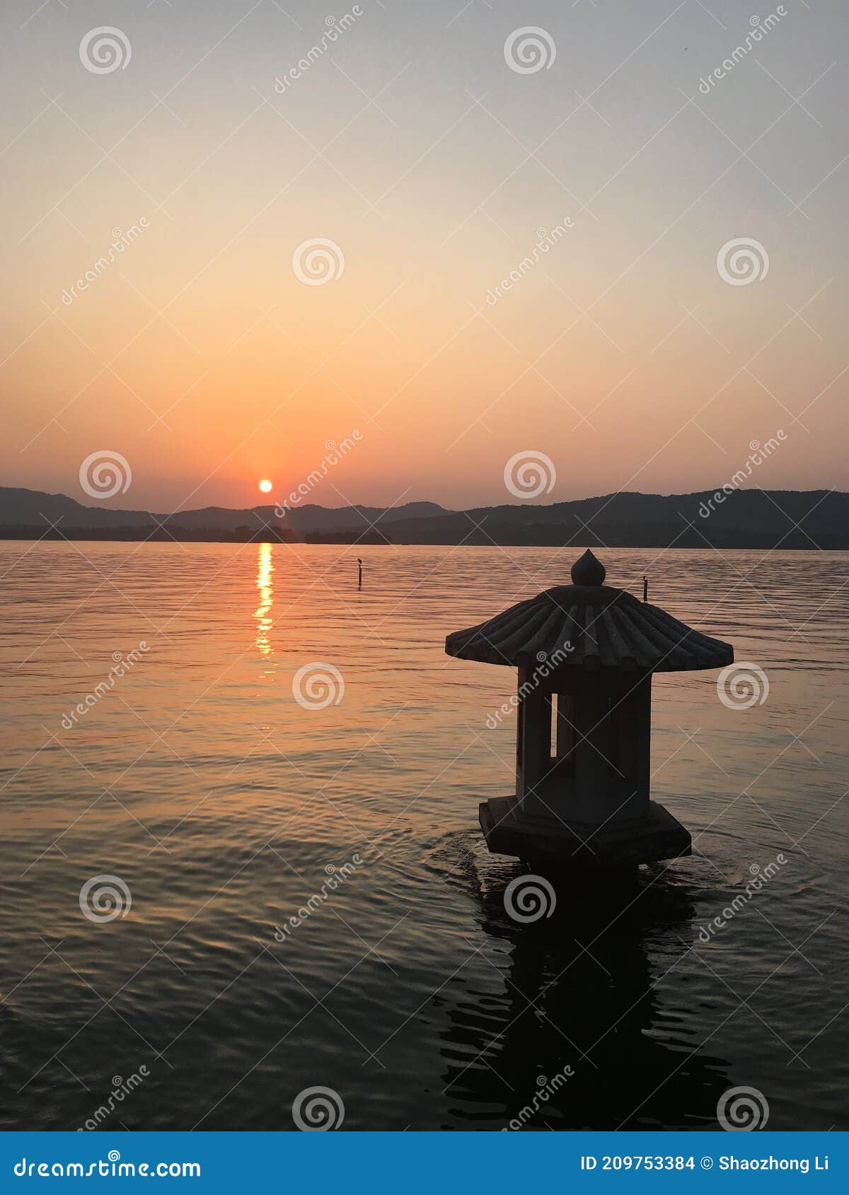 The SUNSET of WEST LAKE stock photo. Image of lake, side - 209753384