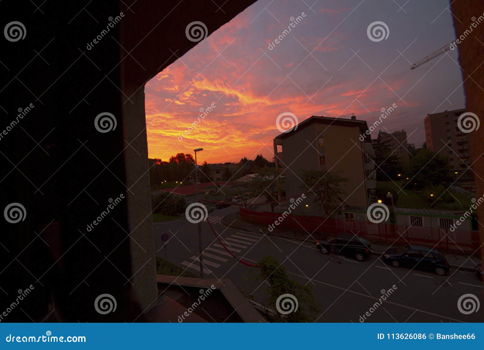 Sunset from the window stock photo. Image of clouds - 113626086