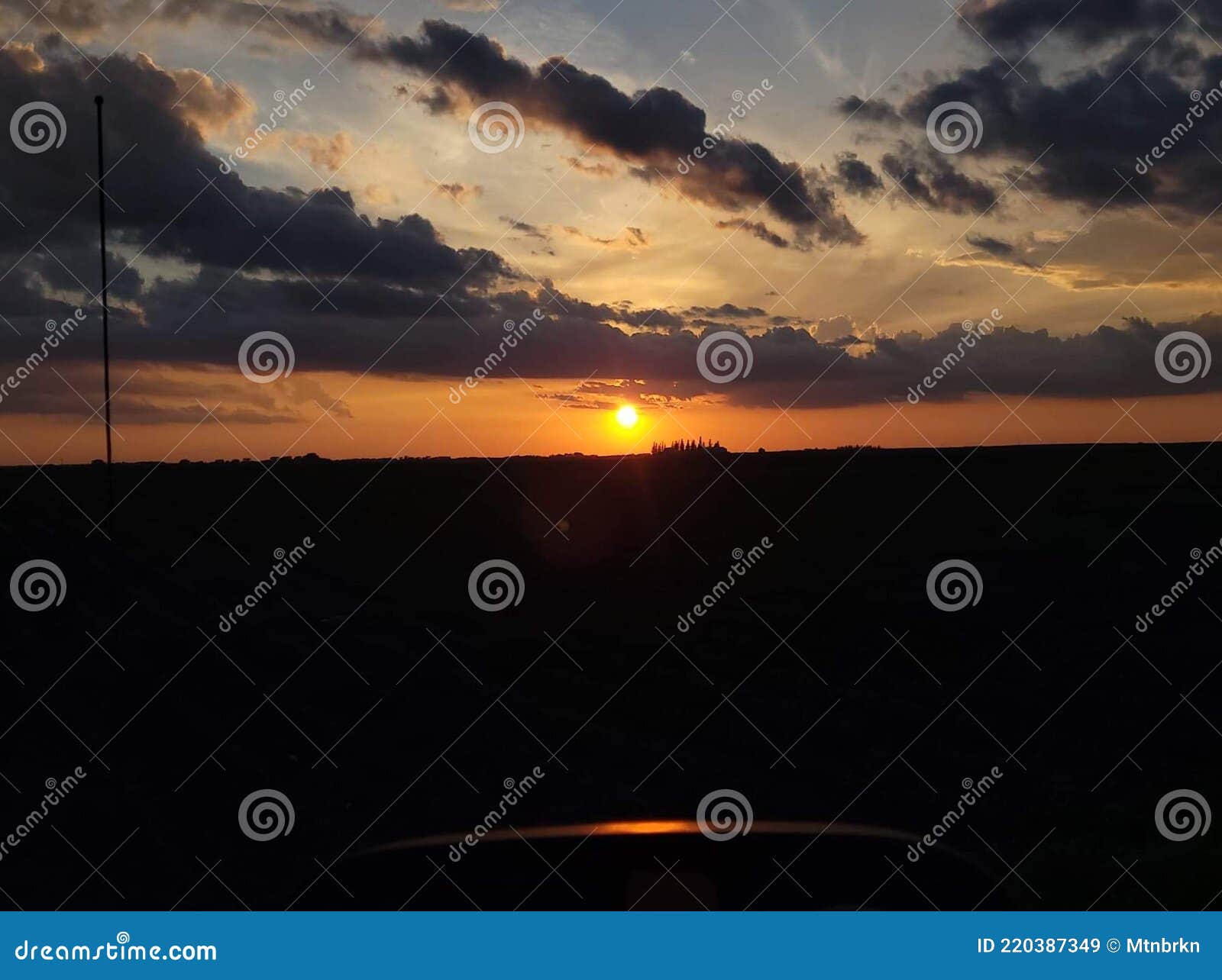 Sunsetting over farm stock image. Image of ocean, night - 220387349