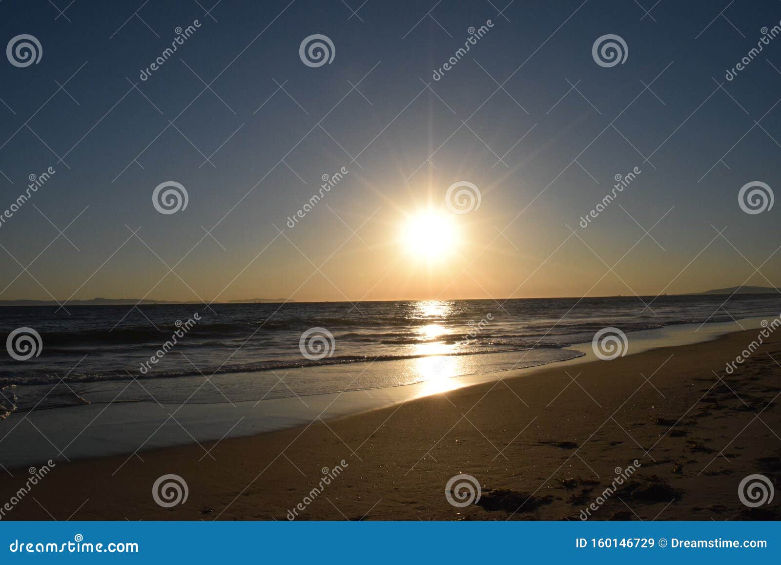 Sunsetting Over the Ocean Horizon Line. Stock Image - Image of beach ...
