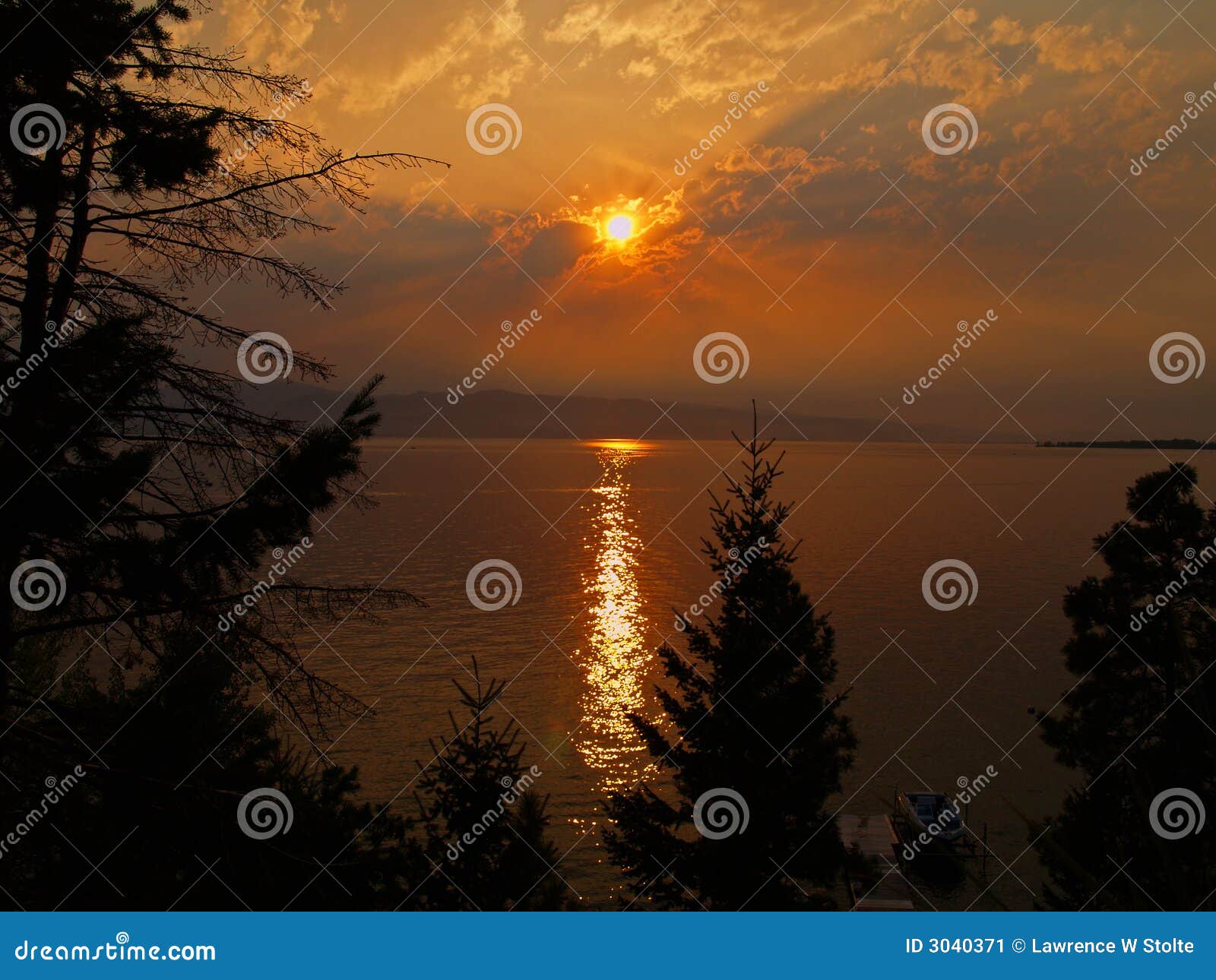 Sunsetting through the Smoke Stock Image - Image of cloud, evening: 3040371