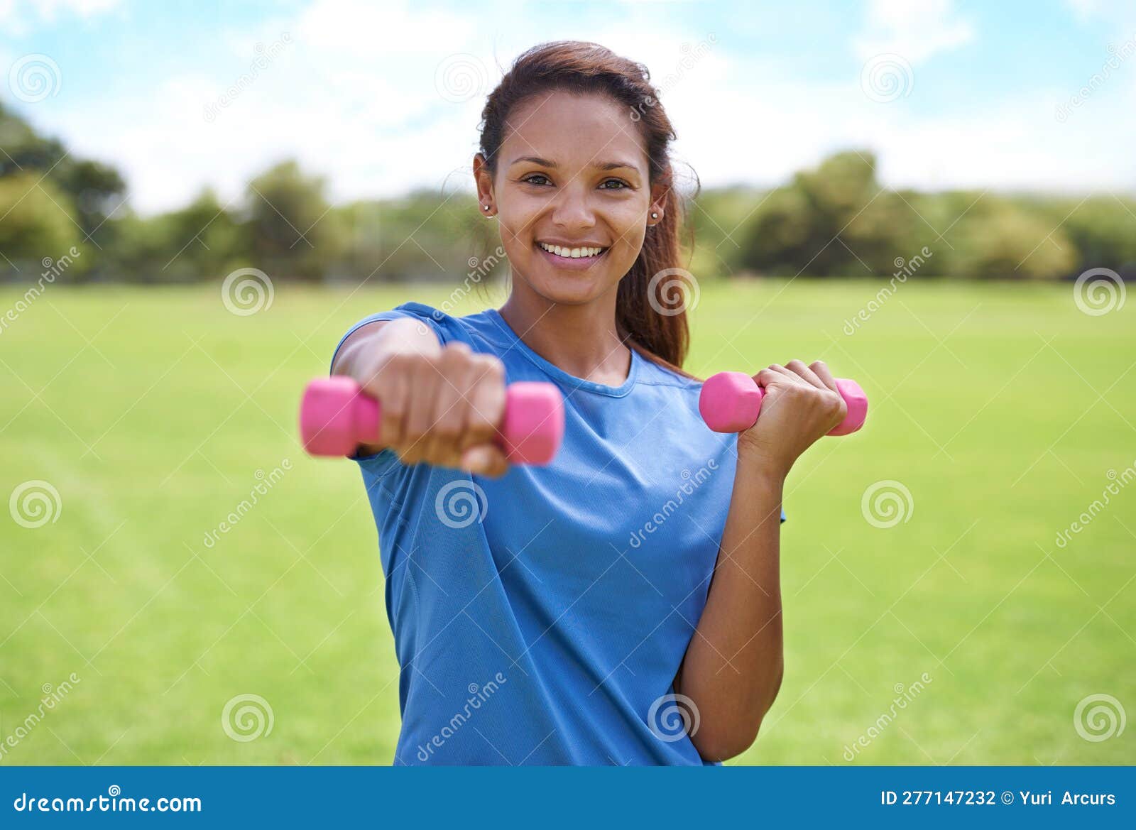 Sunshine and Exercise. a Group of Young Women Exercising Outdoors ...