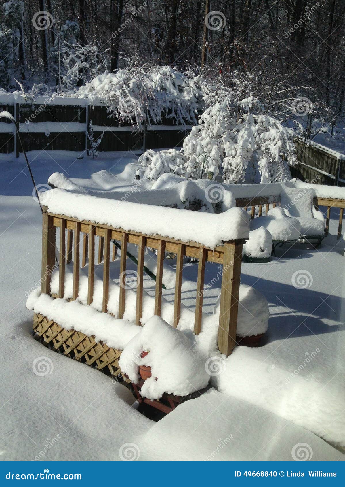 Sunshine Highlights Snow on Backyard Deck and Steps. Stock Photo ...