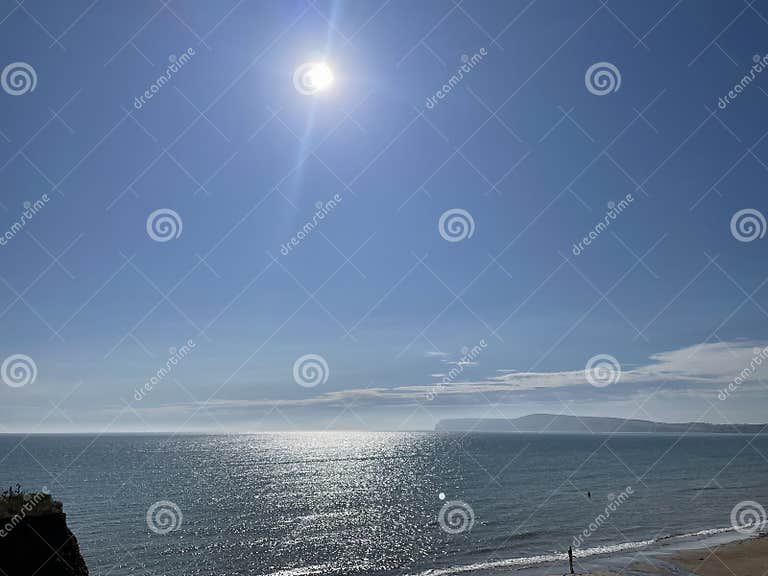Sunshine on the ocean stock image. Image of distance - 327825211