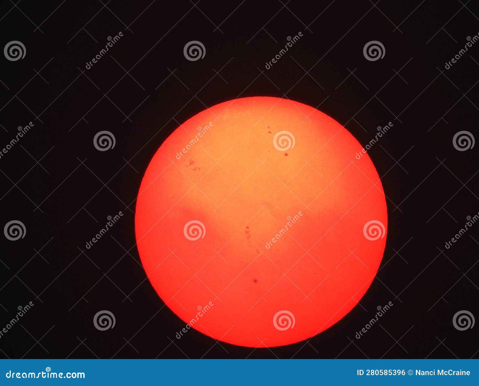 Sunspot Clusters Visible on Orange Sun during Canada Forest Fires Stock ...