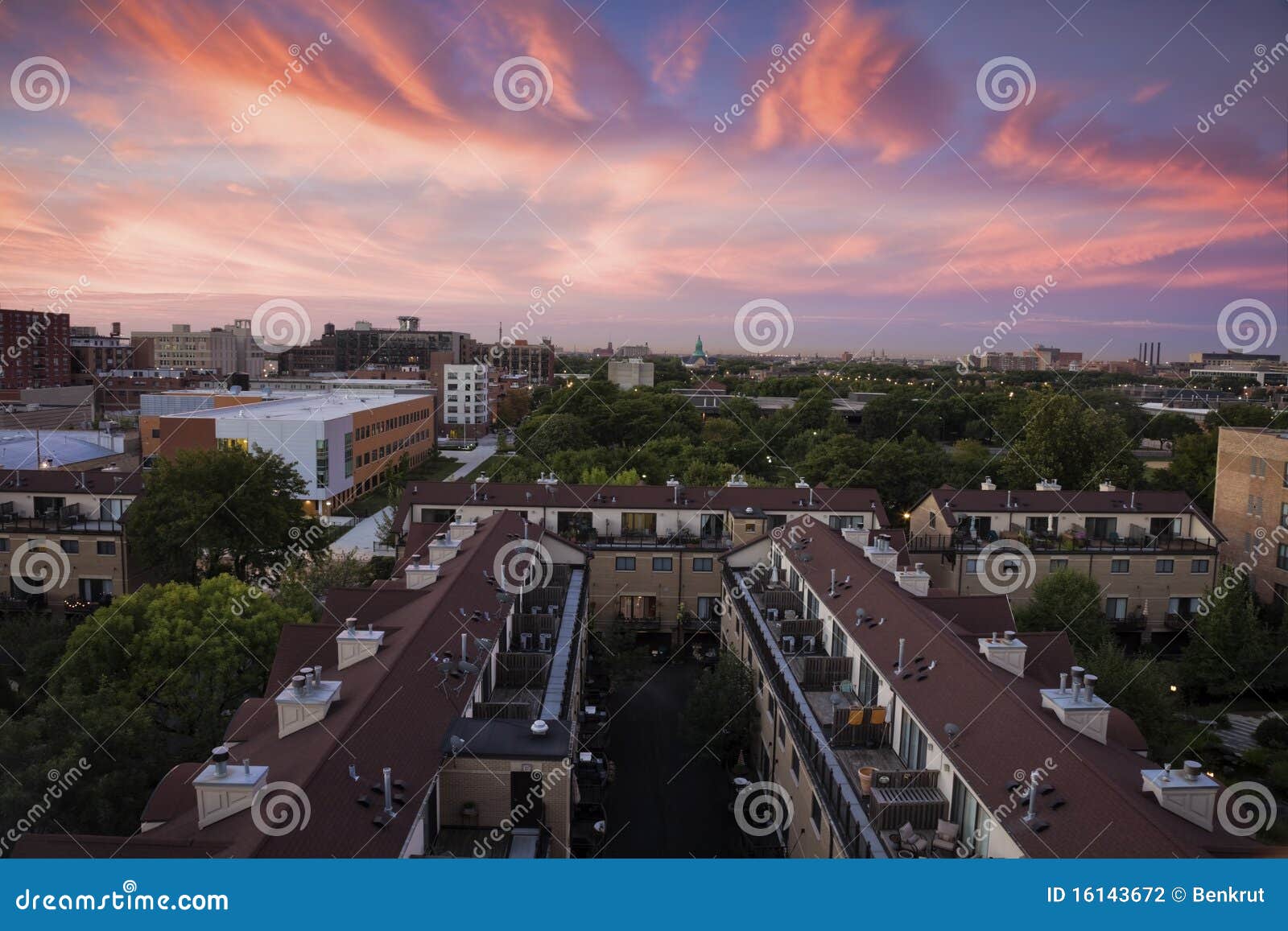 Sunsrise Above Apartment Buildings Stock Photo - Image of colorful ...
