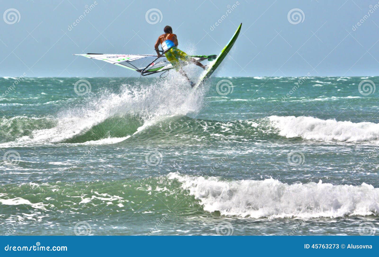 Windsurfer jumps freestyle editorial stock photo. Image of sailing ...