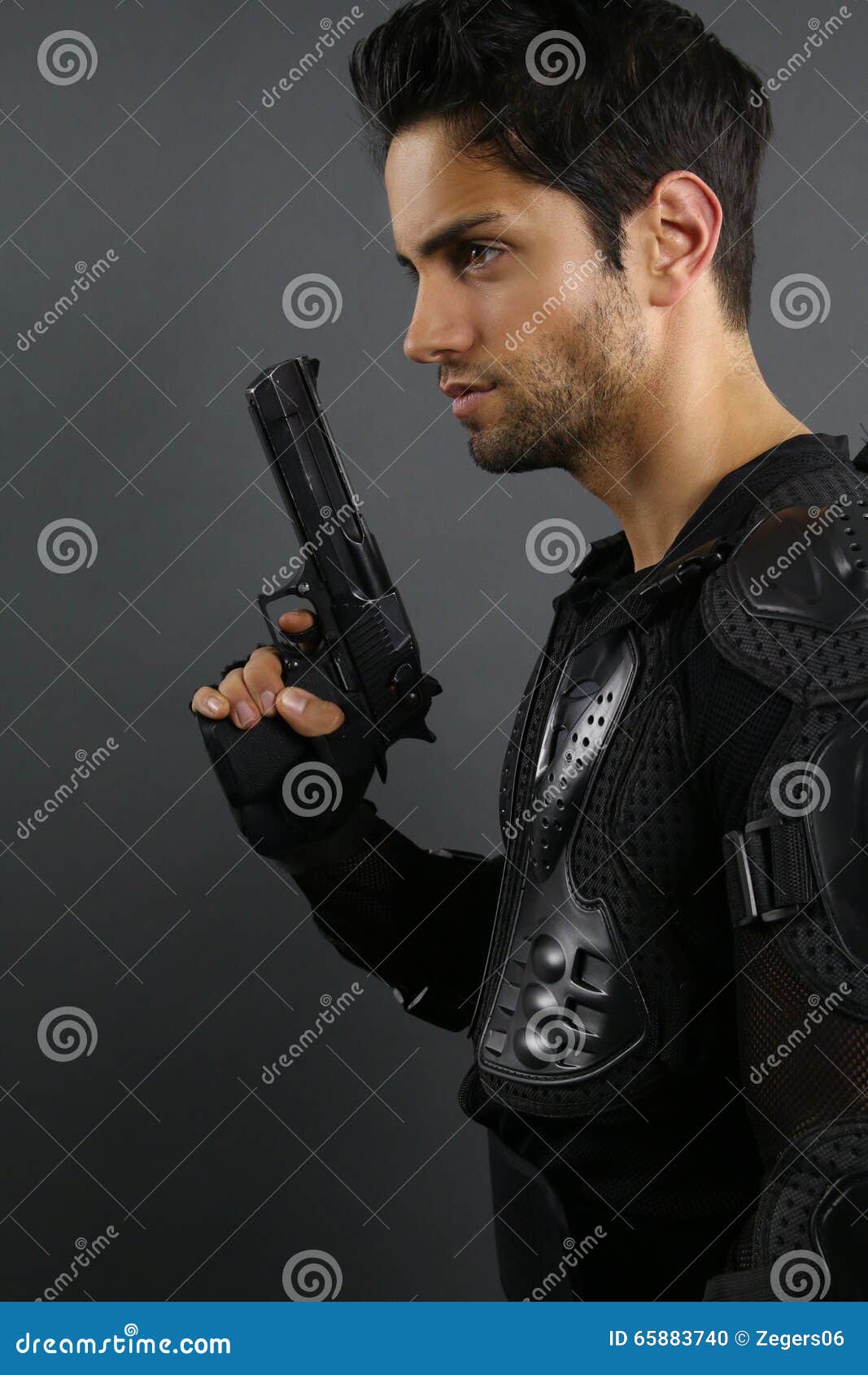 Super Cops - Handsome Man Posing with a Gun Stock Photo - Image of ...